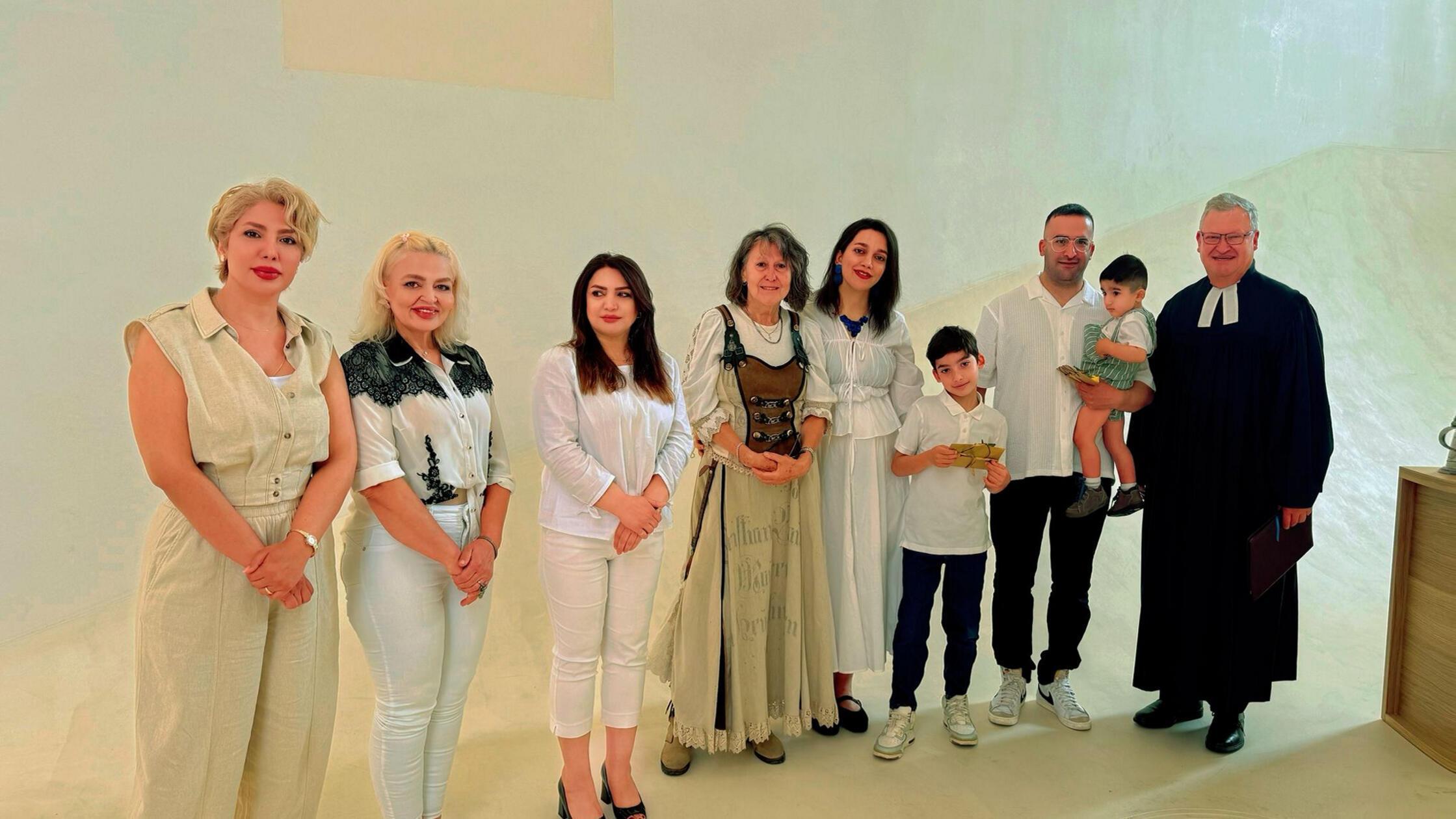 Iranische Familie wird getauft